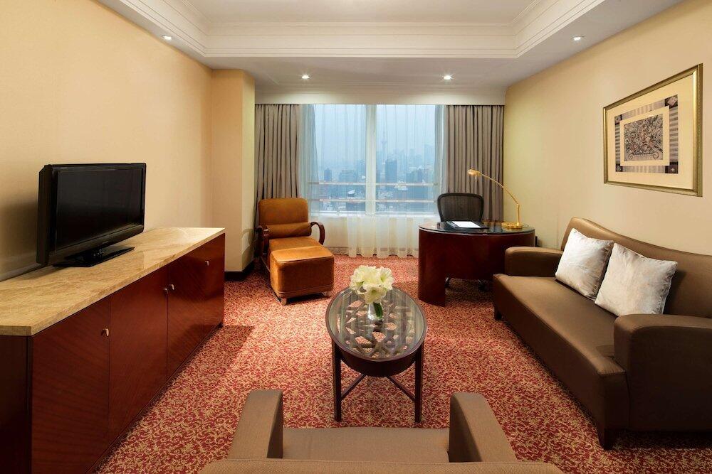 Radisson Blu Hotel Shanghai New World, Shanghai - Central de Reservas