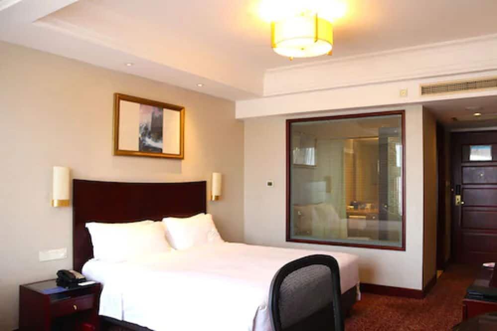 Radisson Blu Hotel Shanghai New World, Shanghai - Central de Reservas