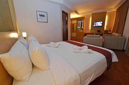 The Axana Hotel - Padang, Padang - Central de Reservas