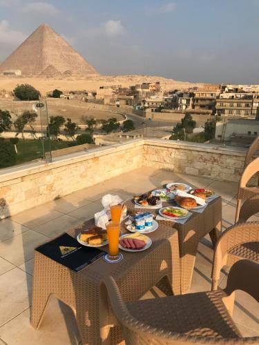 Hotel Sahara Pyramids Inn, Giza - Central de Reservas